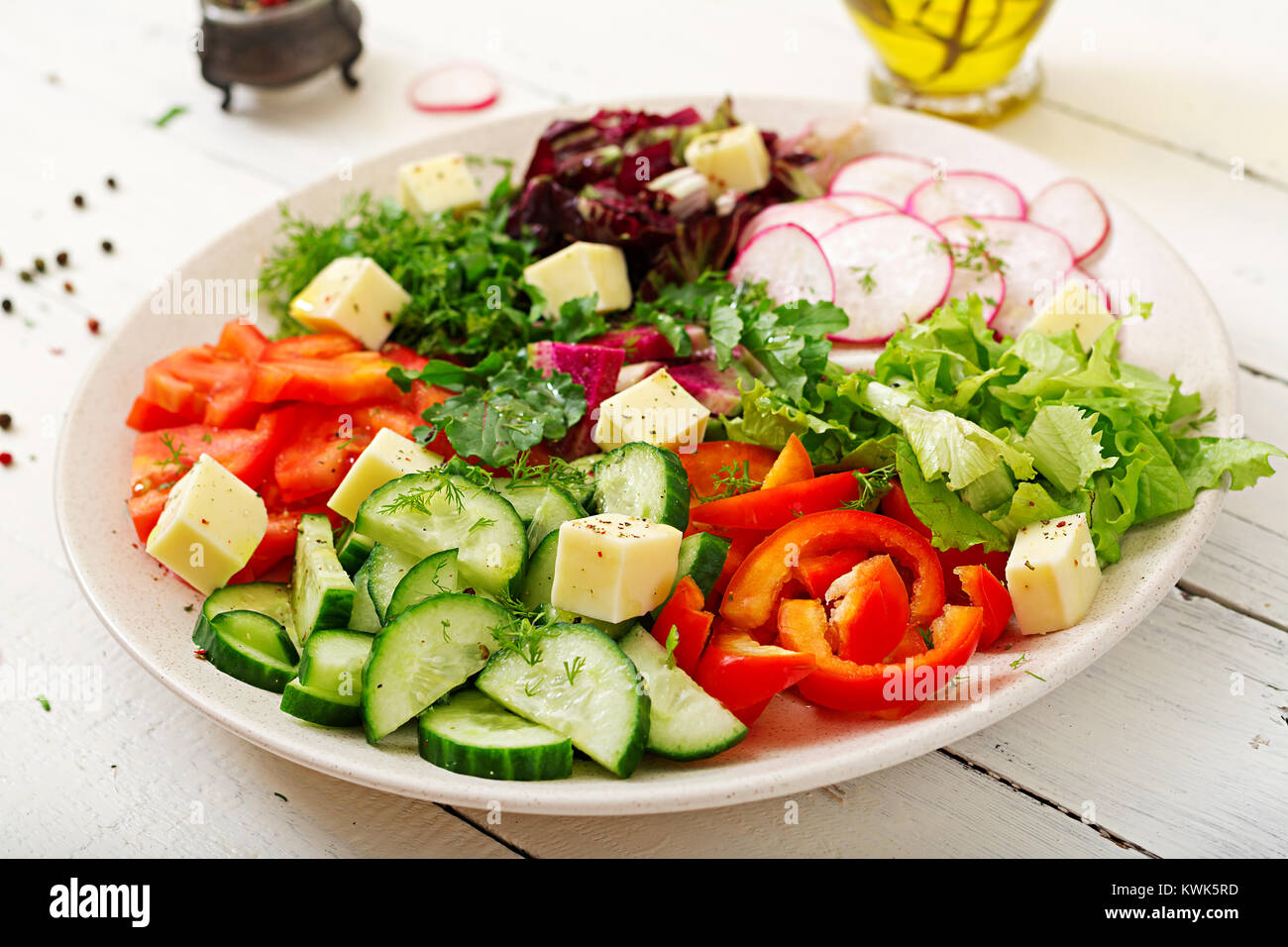 Mix salad from fresh vegetables and greens herbs. Dietary menu. Proper ...