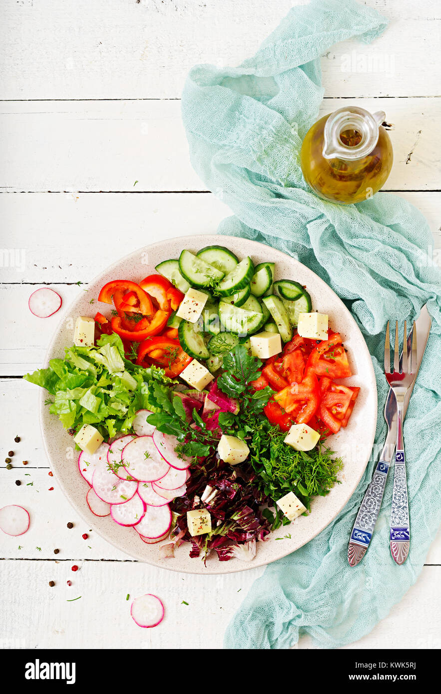 Mix salad from fresh vegetables and greens herbs. Dietary menu. Proper ...