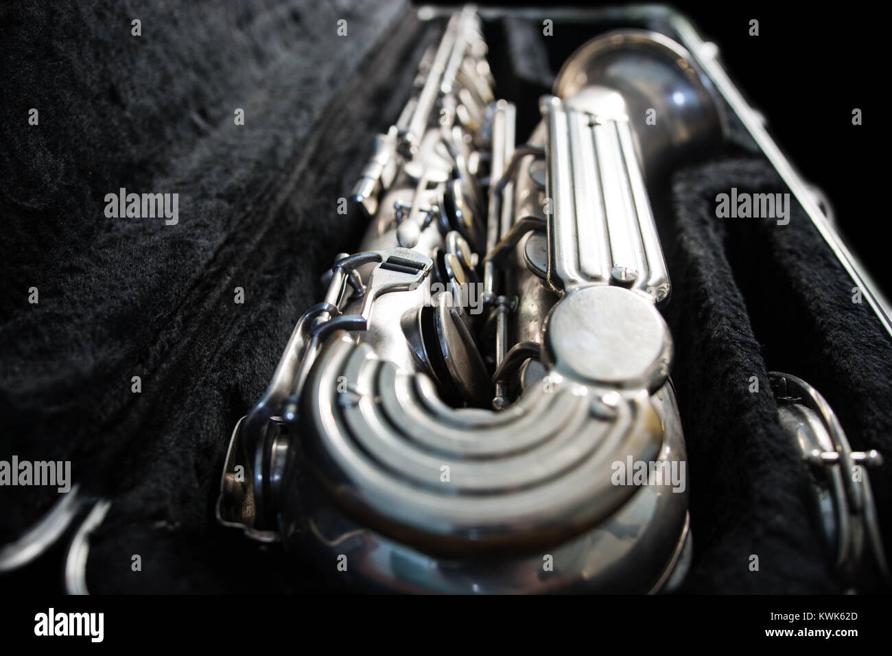 Silver saxophone in its case Stock Photo - Alamy