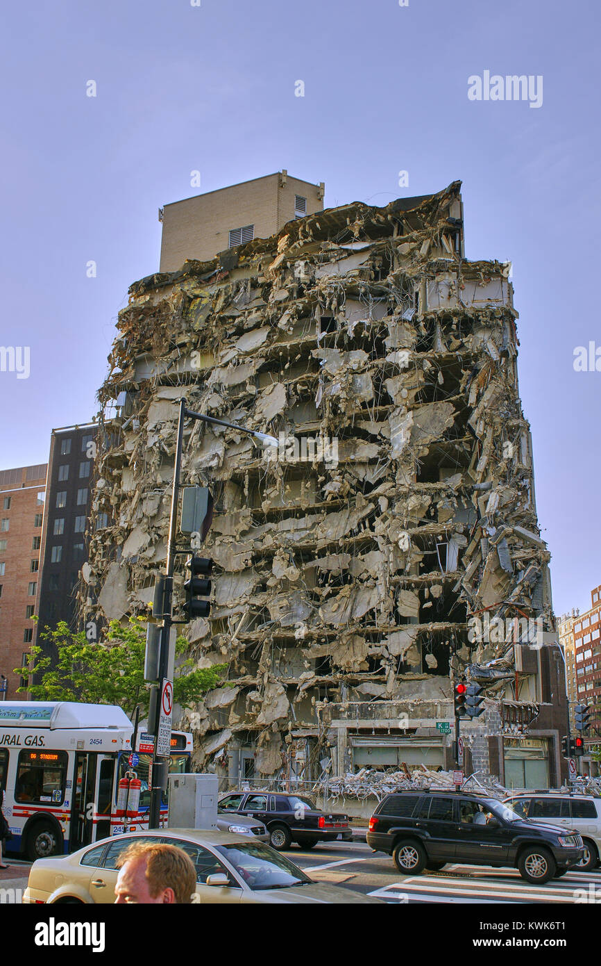 building half way through demolition looking like its melting Stock ...