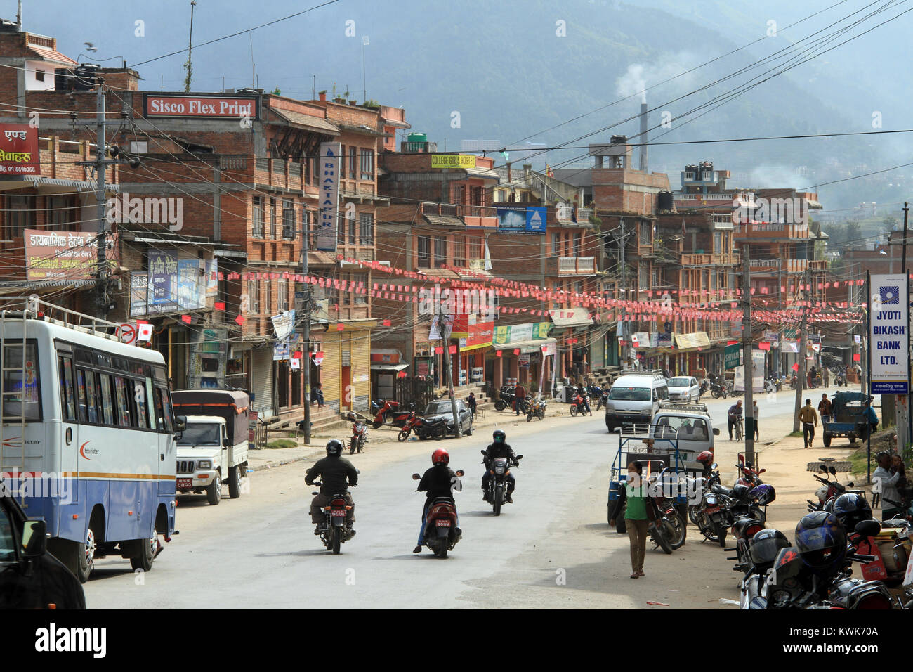 BHAKTAPUR, NEPAL - CIRCA NOVEMBER 2013 Traffic on the main road Stock ...