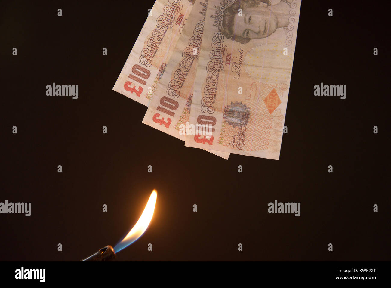 Burning cash hi-res stock photography and images - Alamy