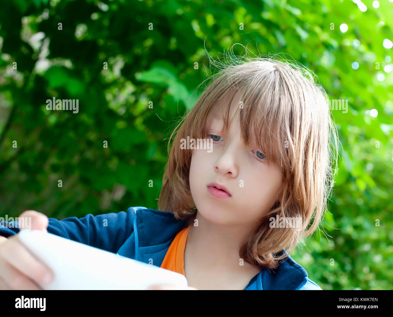 Child kid boy texting message hi-res stock photography and images - Alamy
