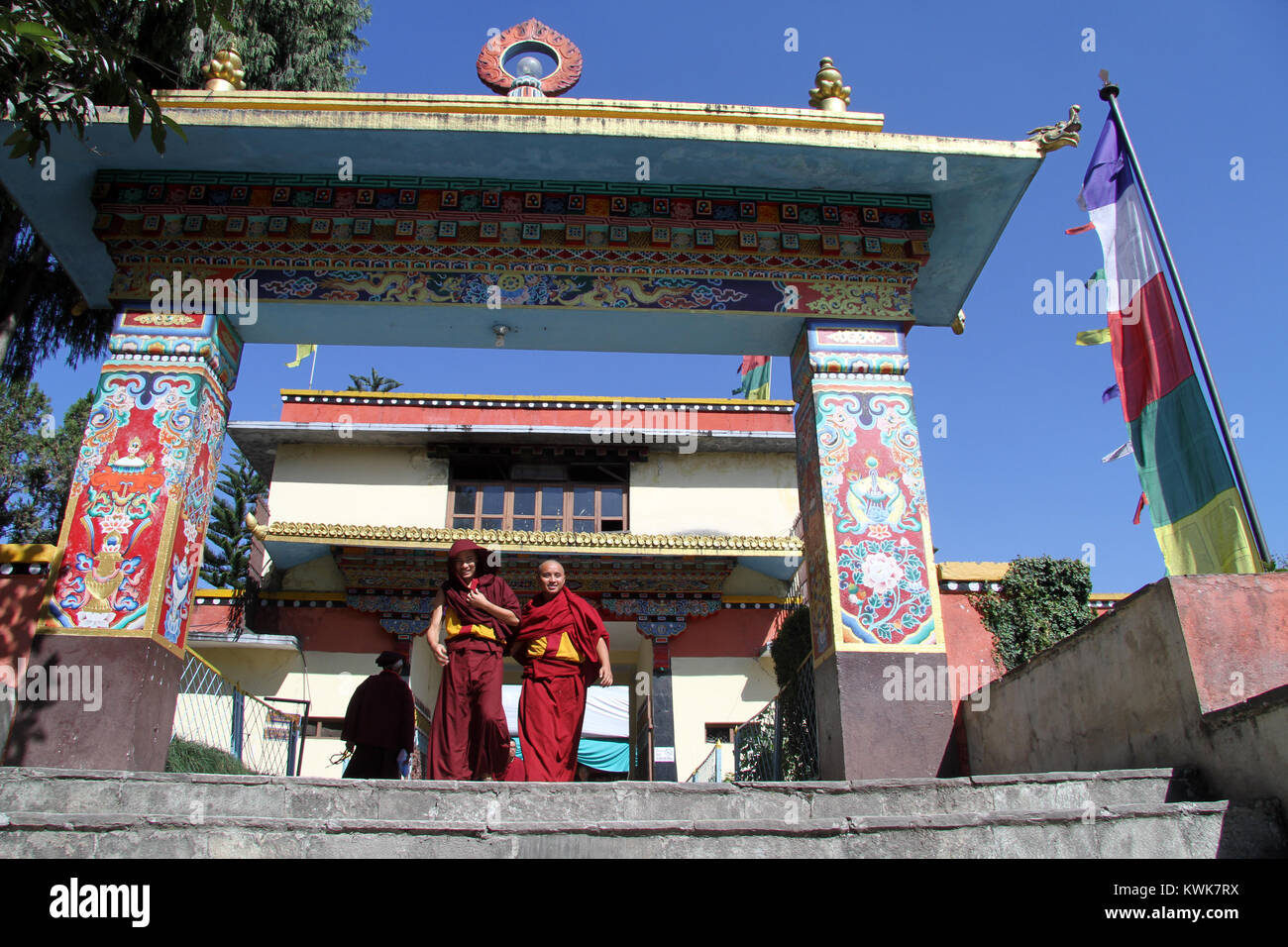 Two monks and gate of Shechen monastery in Kathmandu, Nepal Stock Photo ...