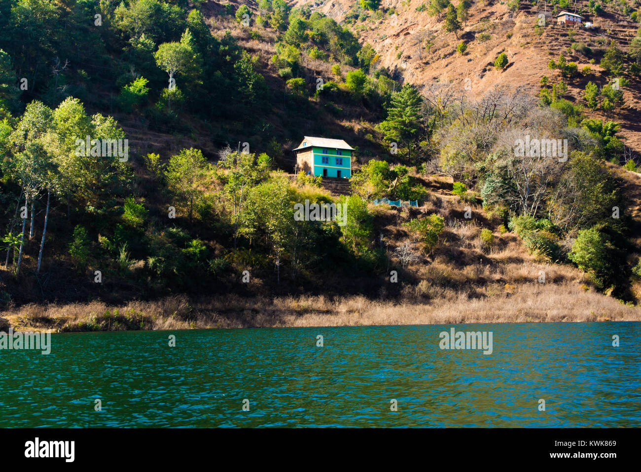Beautiful Village Lake and Boat Stock Photo - Alamy
