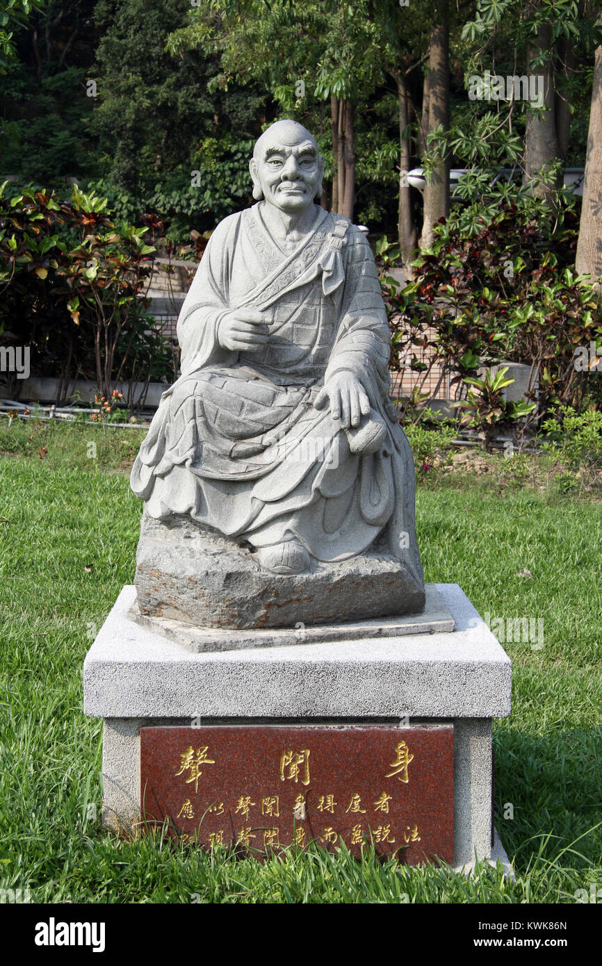 Man near buddha statue hi-res stock photography and images - Alamy