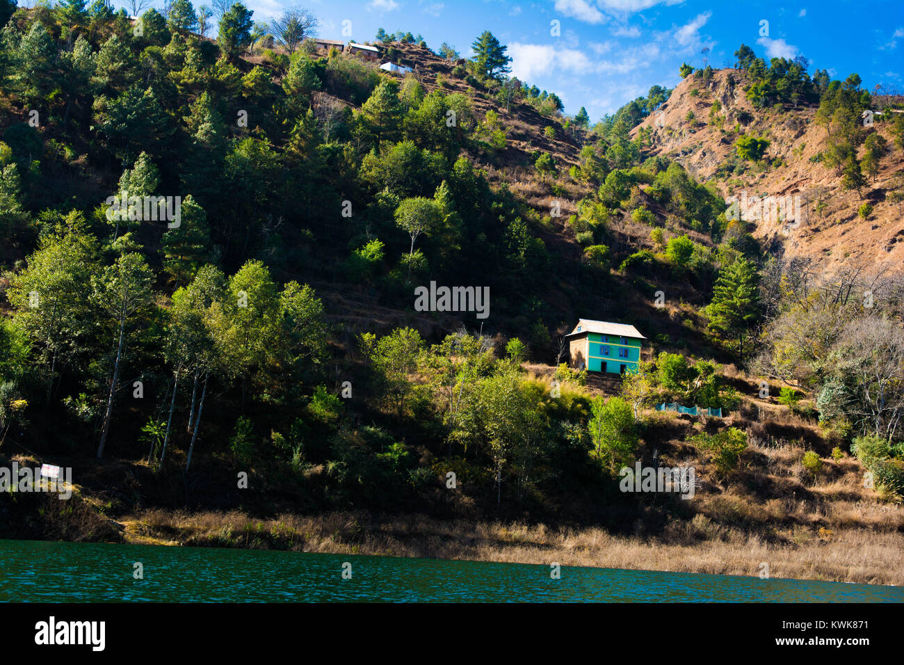 Beautiful Village Lake and Boat Stock Photo - Alamy