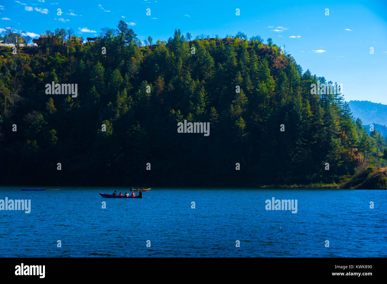Beautiful Village Lake and Boat Stock Photo - Alamy