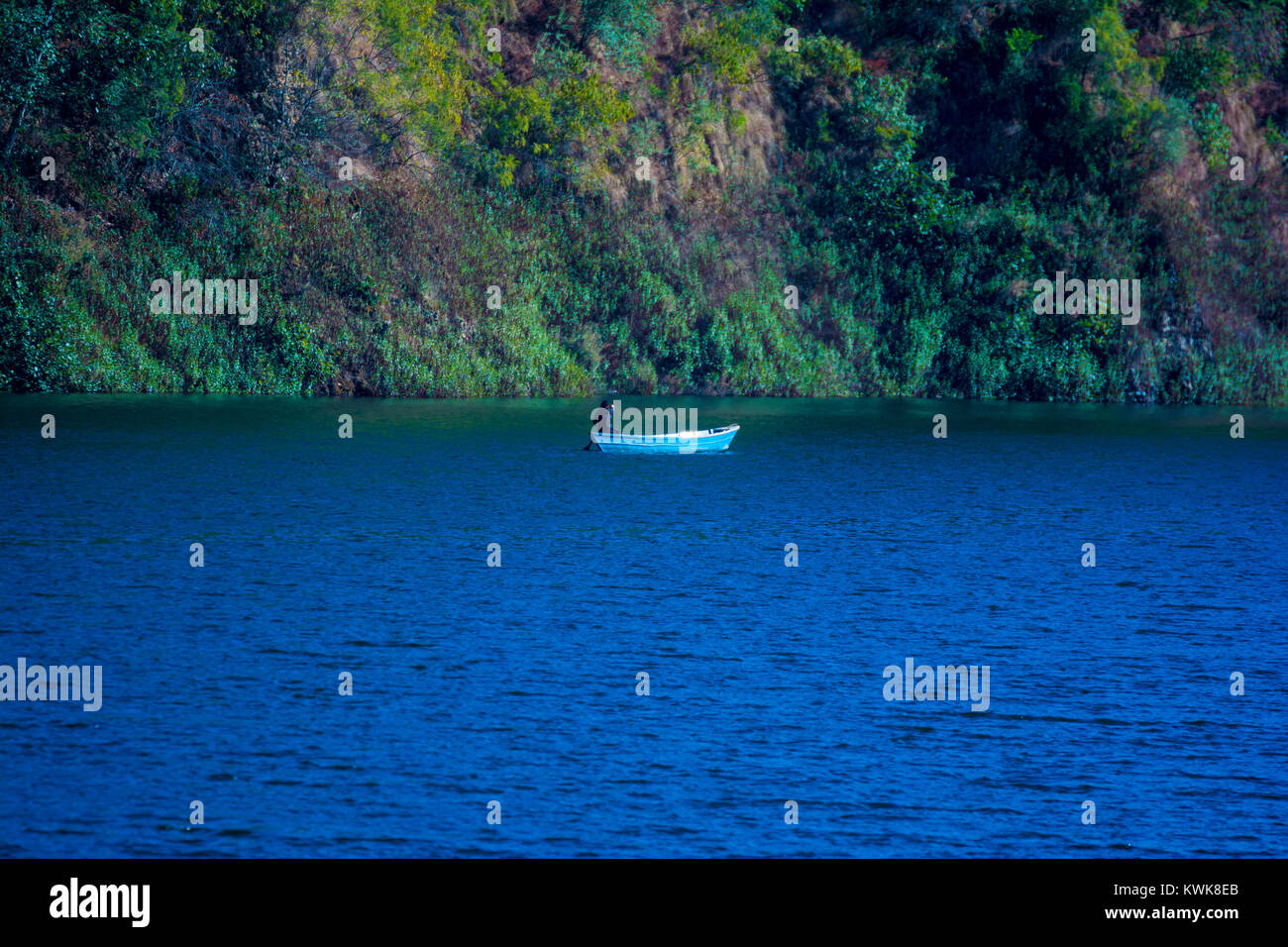 Beautiful Village Lake and Boat Stock Photo - Alamy