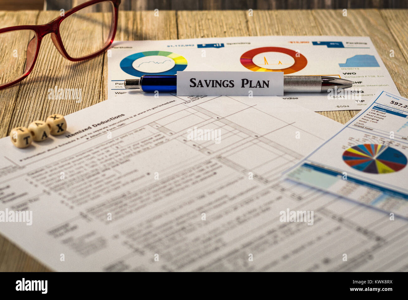 Savings Plan motivational concept with charts and graphs and calculator ...
