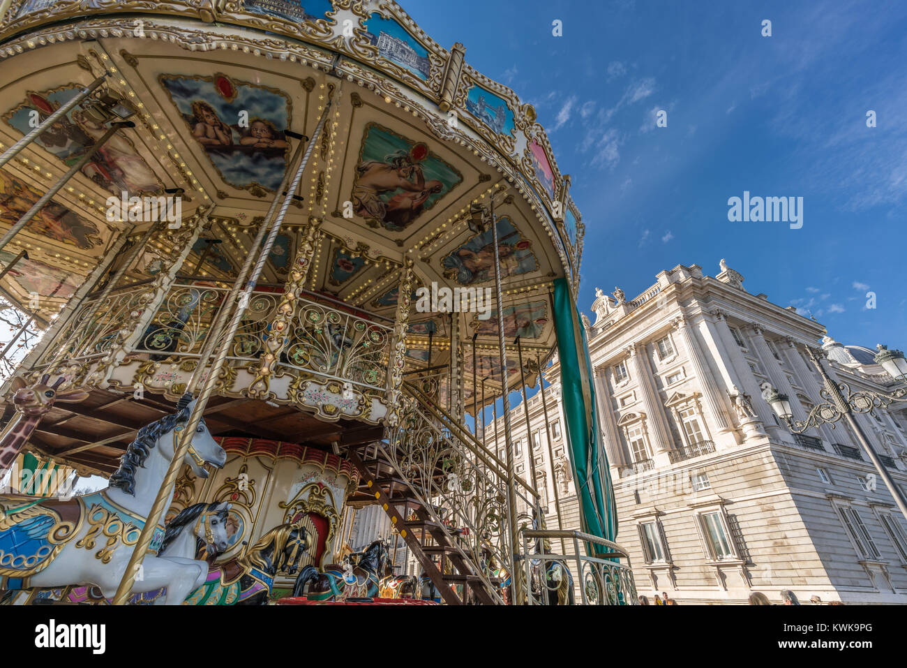 Tourists and local people walking and enjoying Colorful carousel ...