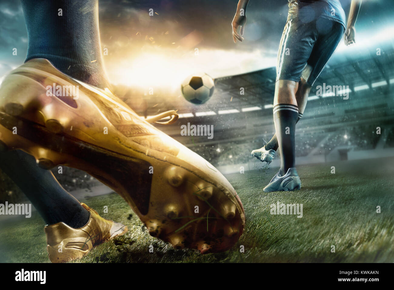 The active players of football at stadium in motion Stock Photo - Alamy