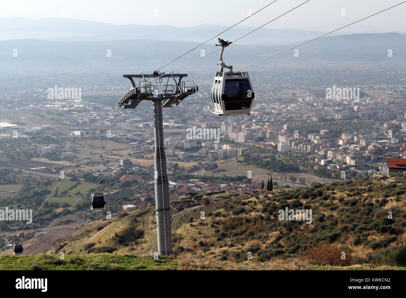 Cable car on the hjill with acropolis in Bergama, Turkey Stock Photo ...