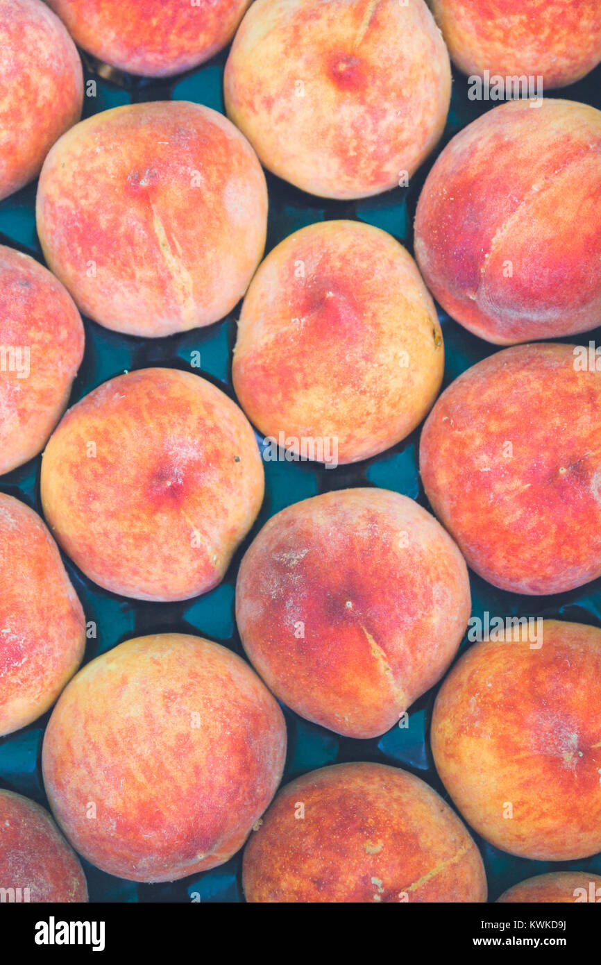 Delicious ripe peaches in the market on the counter Stock Photo - Alamy
