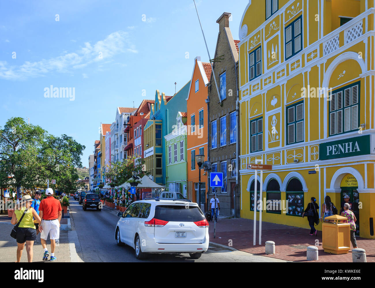 Colorful Curacao Street with shops and tourists Stock Photo - Alamy