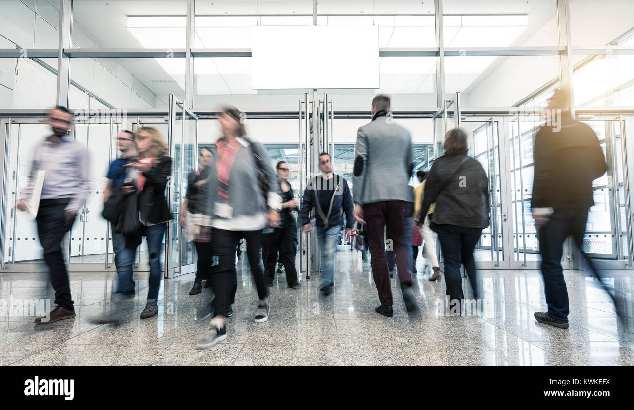 business people crowd rushing in a entrance at a business center Stock ...