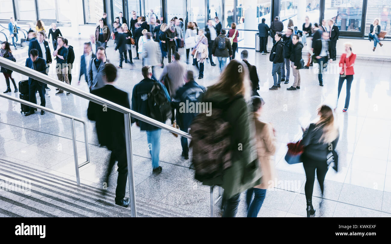 crowd of people rushing in a airport Stock Photo - Alamy
