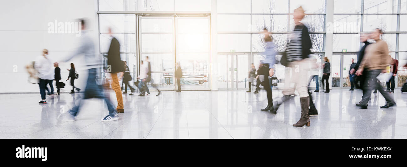 crowd of people walking at modern floor Stock Photo - Alamy