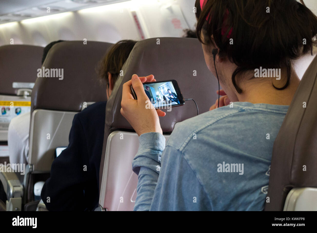 Airplane phone passengers hi-res stock photography and images - Alamy