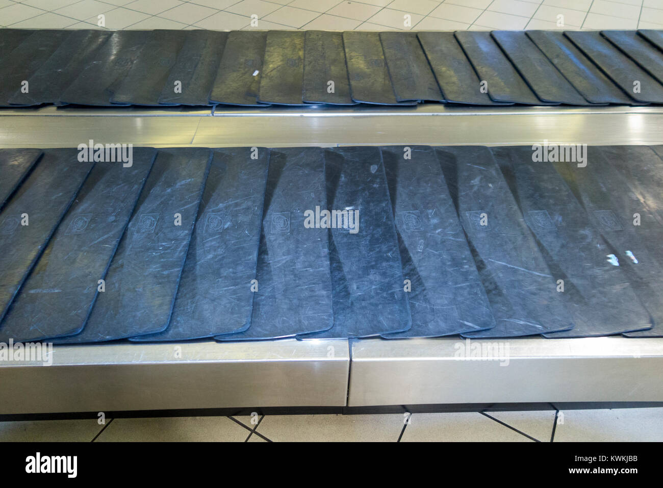 Luggage claim / baggage reclaim carousel conveyor belt at London City ...