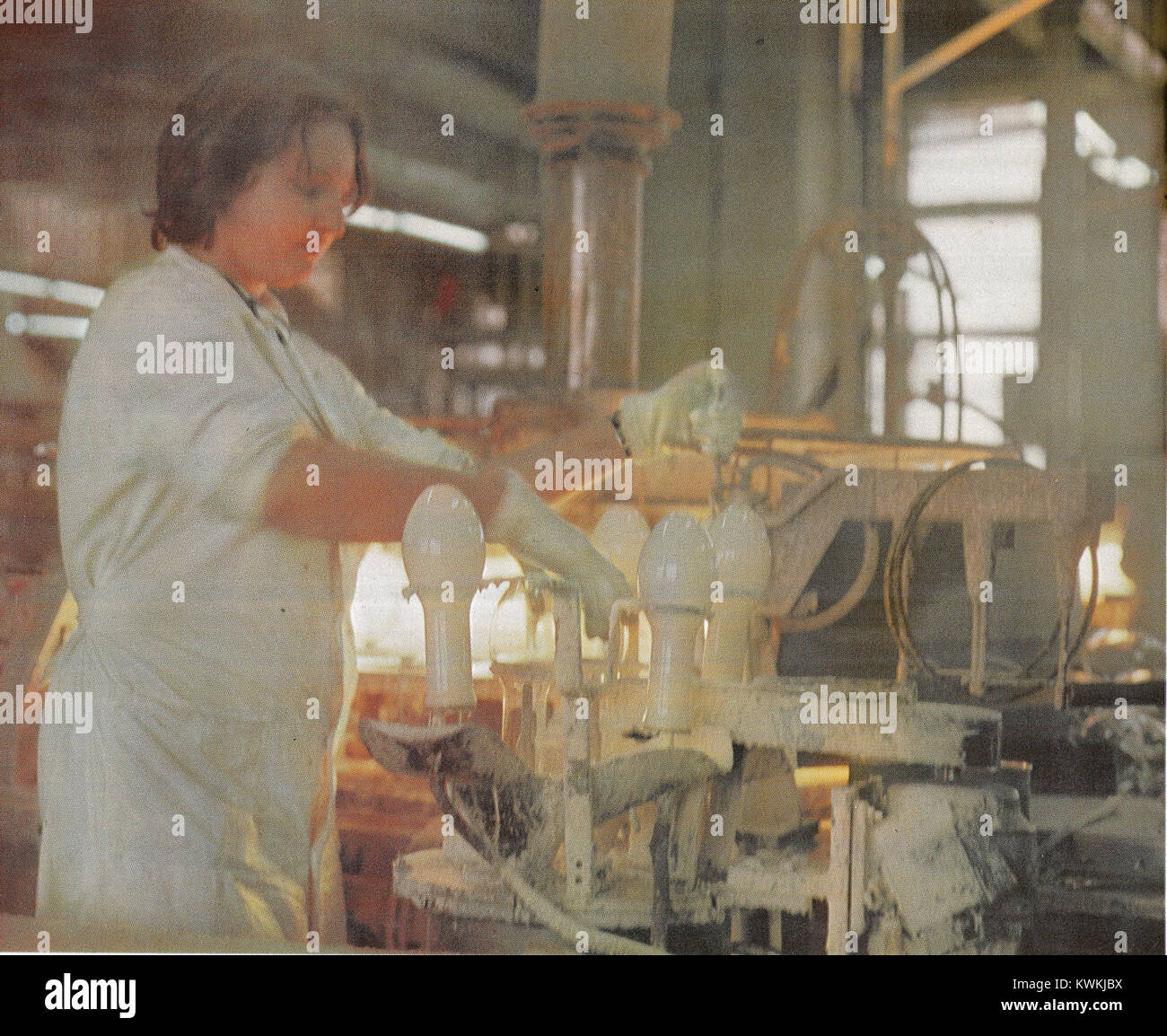 A photograph showing the process of applying phosphor coating at the ...