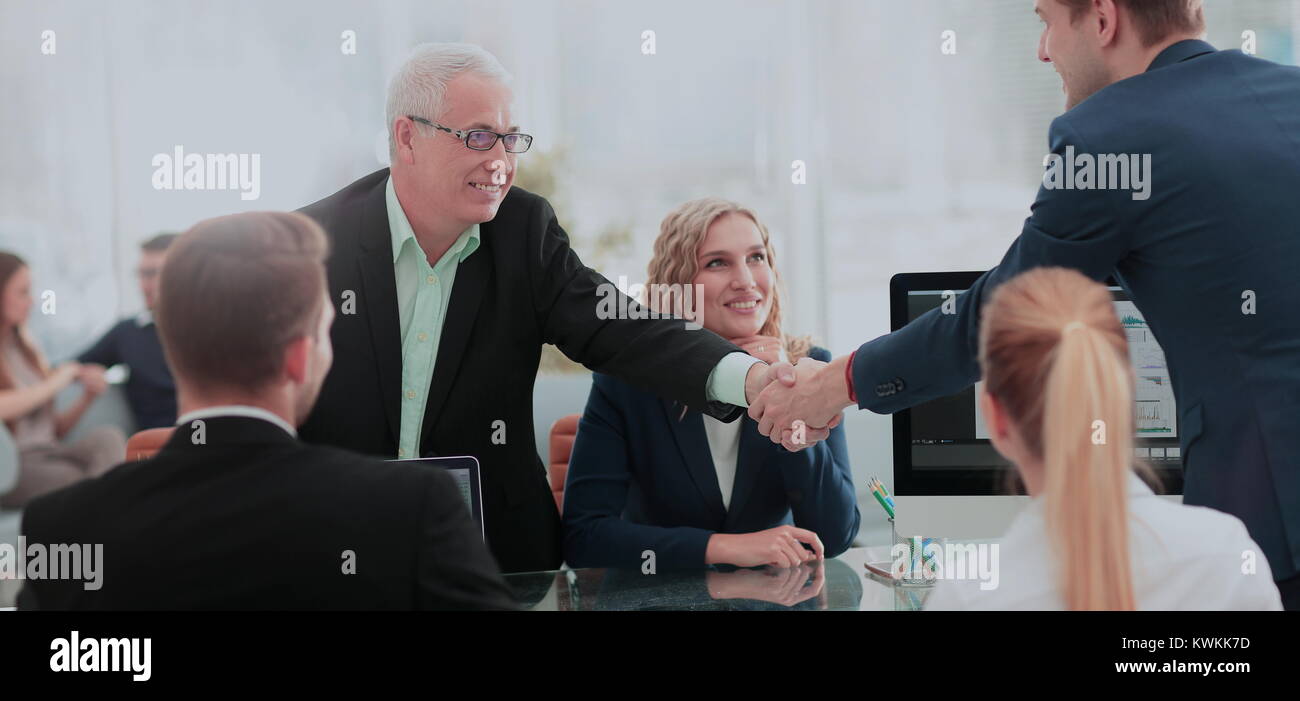 Business partners shaking hands after a successful transaction Stock ...