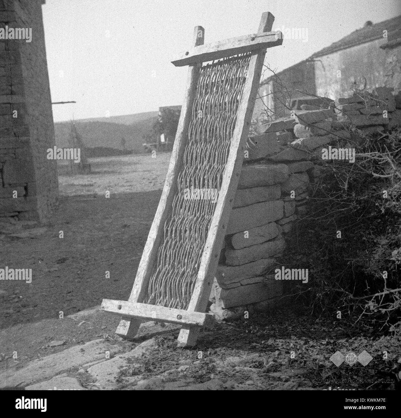 A 1950 photograph showing a stone-weighing scale in Burji, used in ...