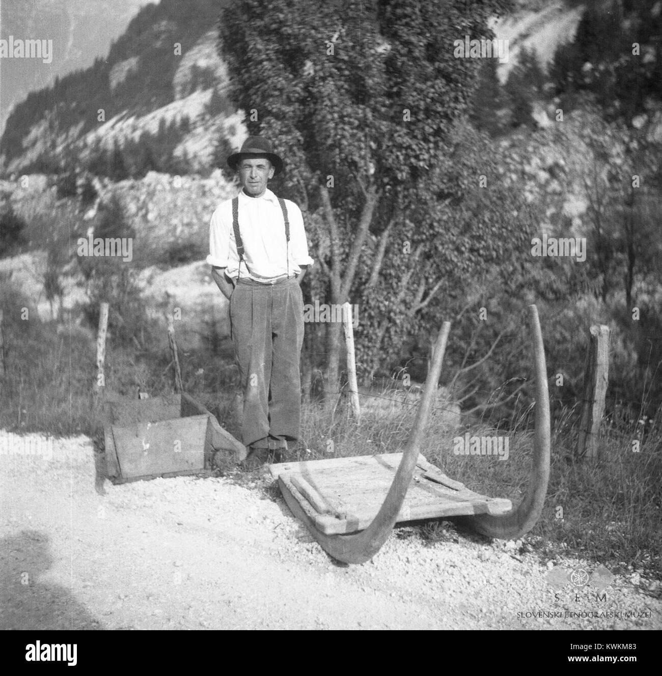 A photograph from 1952 showing the owner Jože Cuder's farm in Slovenia ...