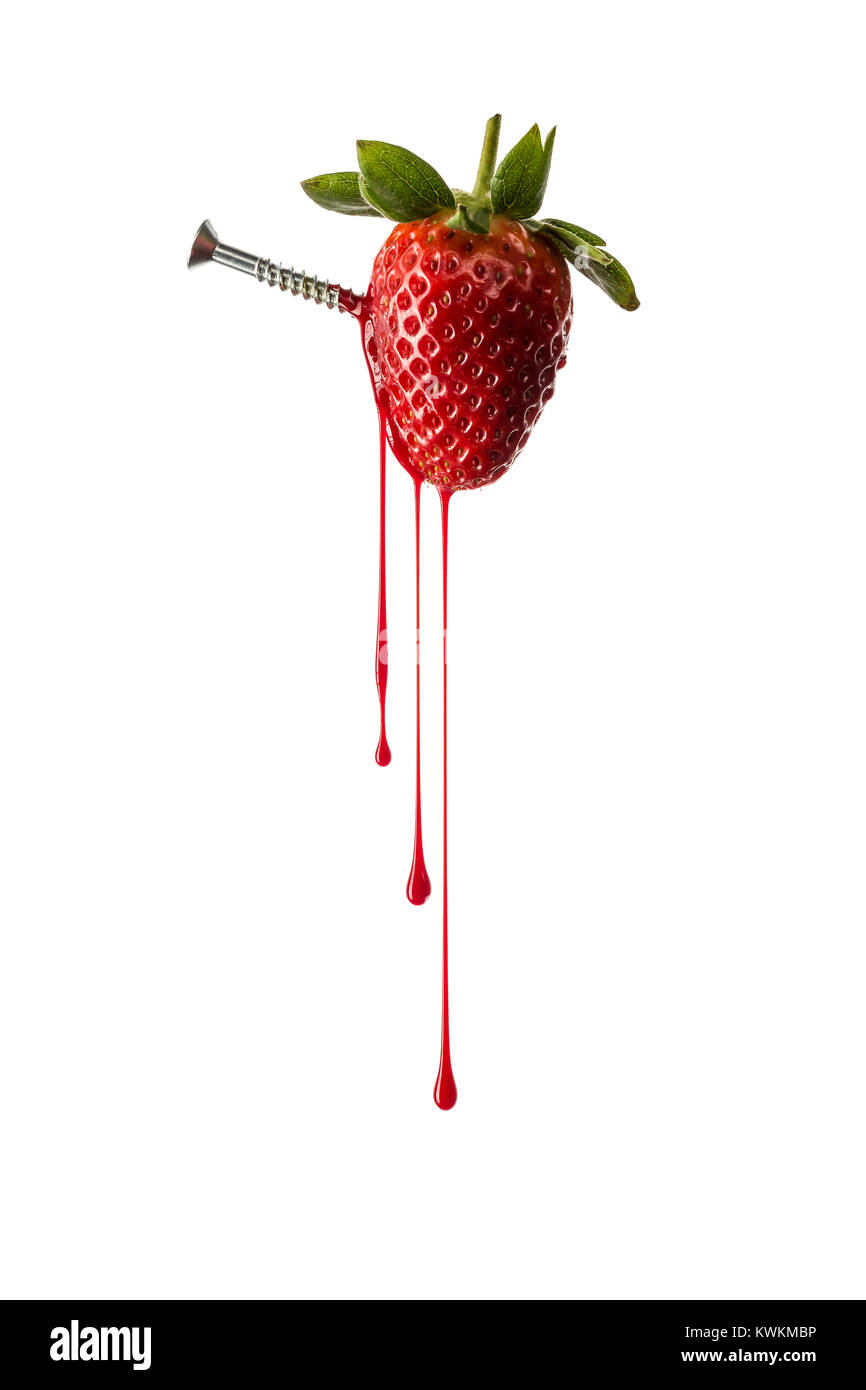 Concept image of a strawberry bleeding from a screw in its side. Large ...