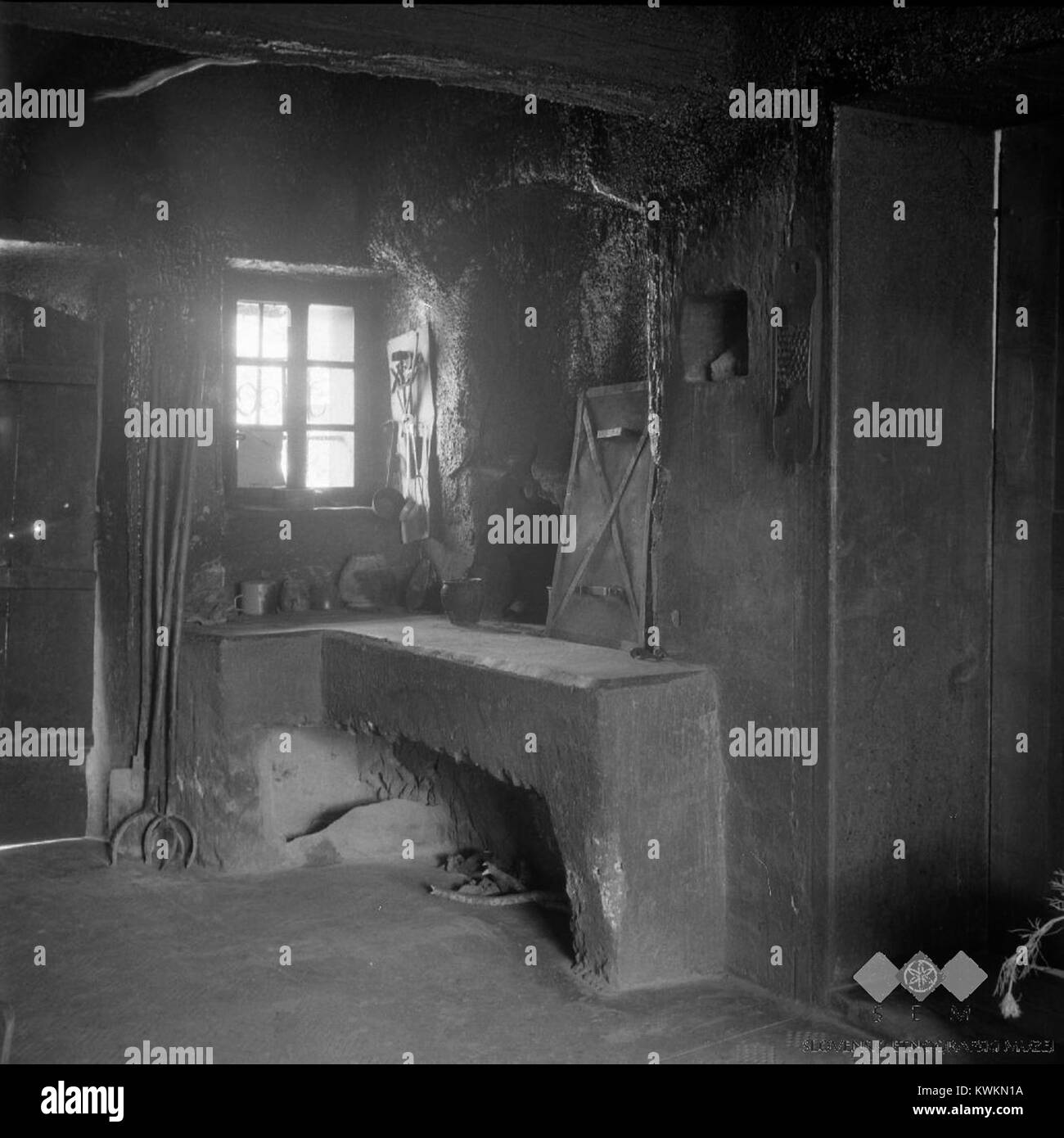 A 1957 photograph shows the hearth (“ognjišče”) at a place called ...