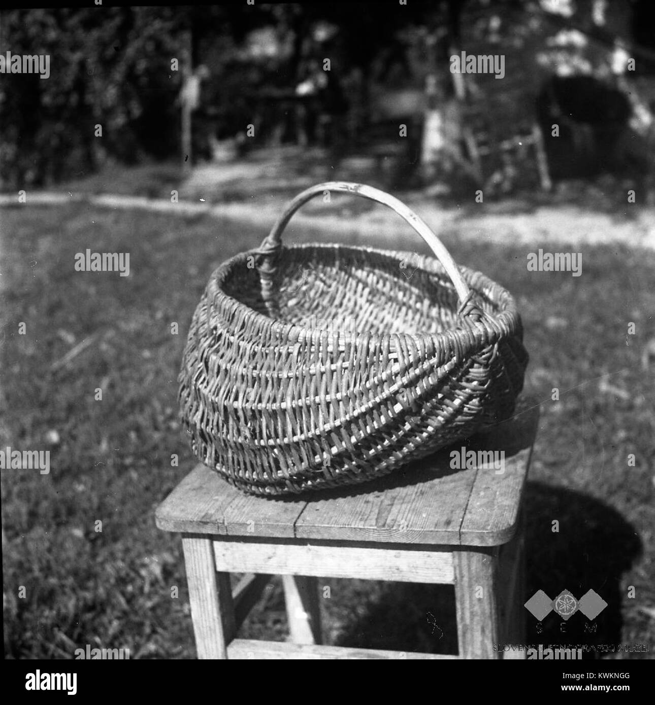 This photograph from 1961 shows a traditional Slovenian basket, known ...