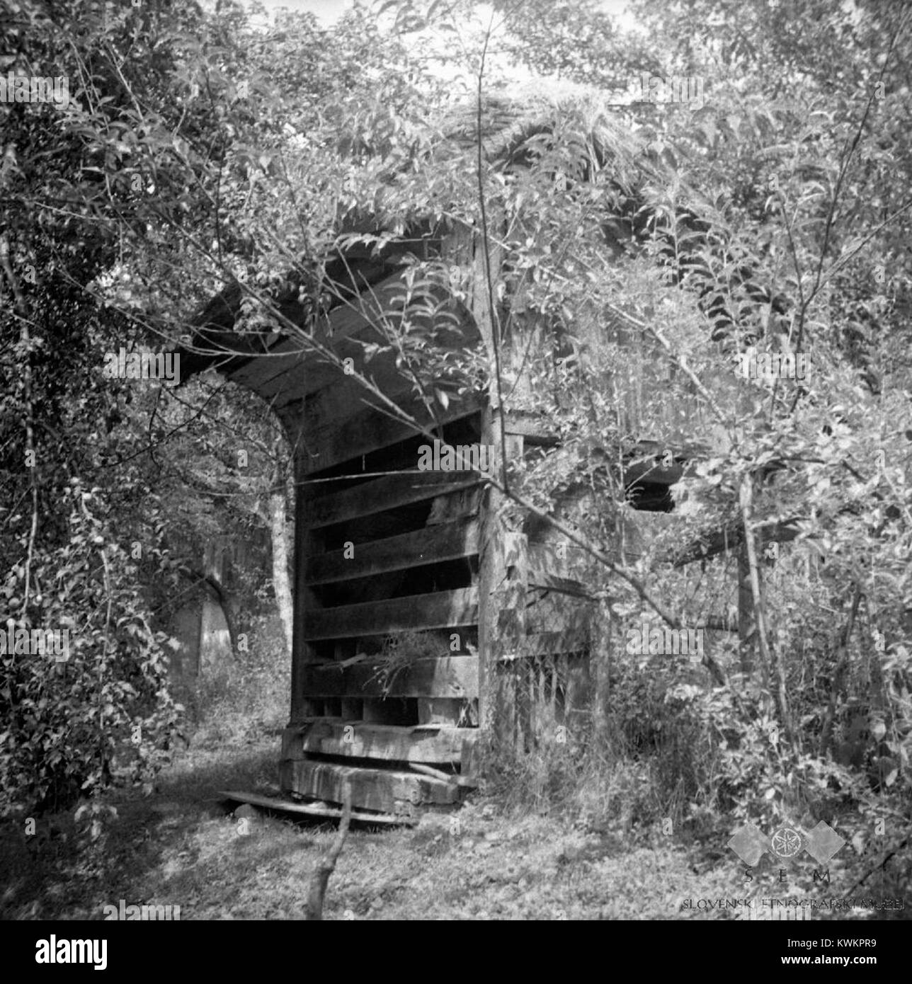Photograph from 1957 showing a traditional beekeeping structure called ...