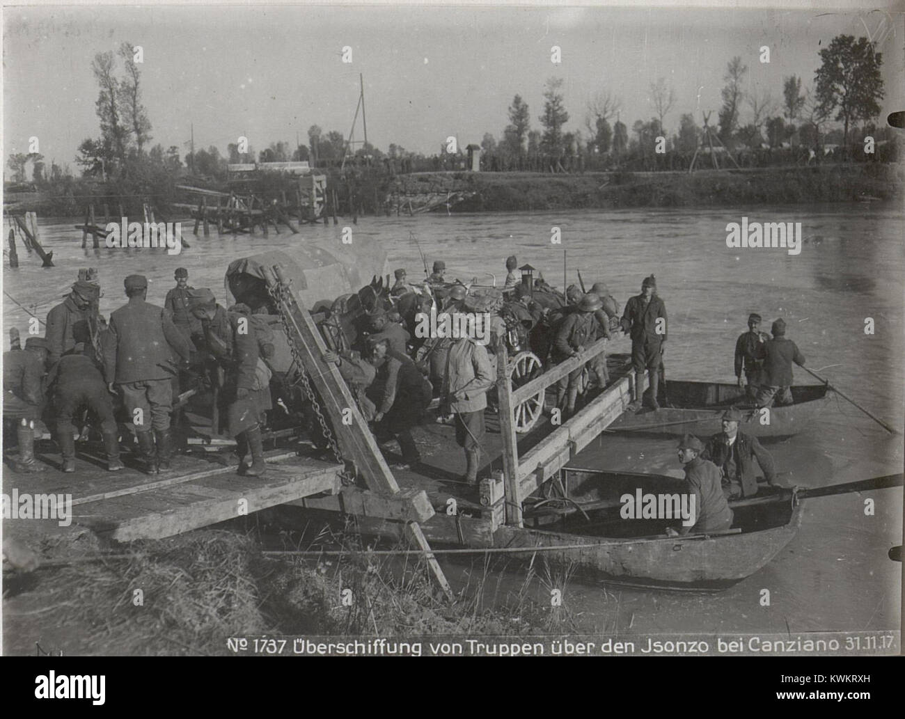 This historical image depicts the crossing of troops over the Isonzo ...