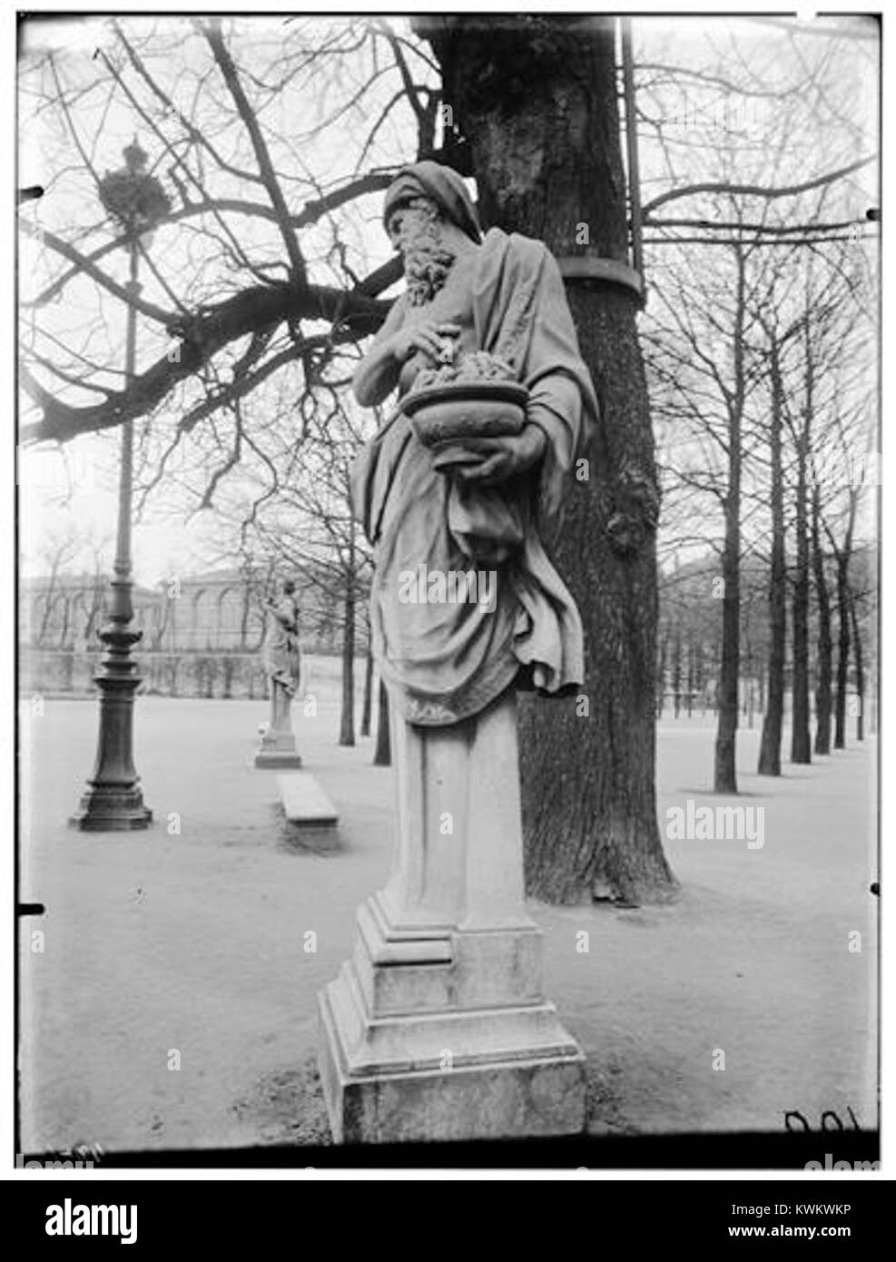 The Statue of Winter in the Jardin des Tuileries, Paris, captures the ...
