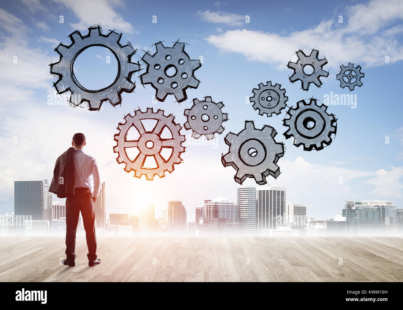 Cogwheel engine drawn on screen as symbol for teamwork and cooperation ...