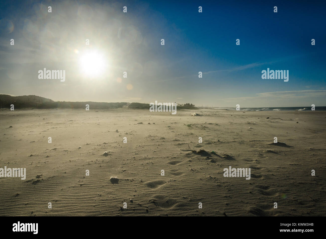 Wavy sand on the beach due to strong wind Stock Photo - Alamy