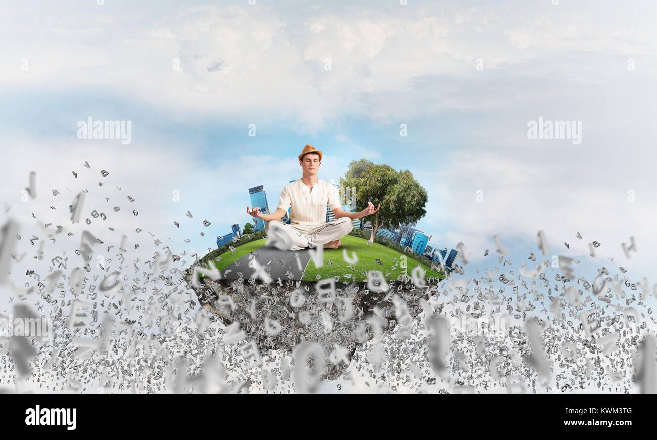 Young man keeping mind conscious Stock Photo - Alamy