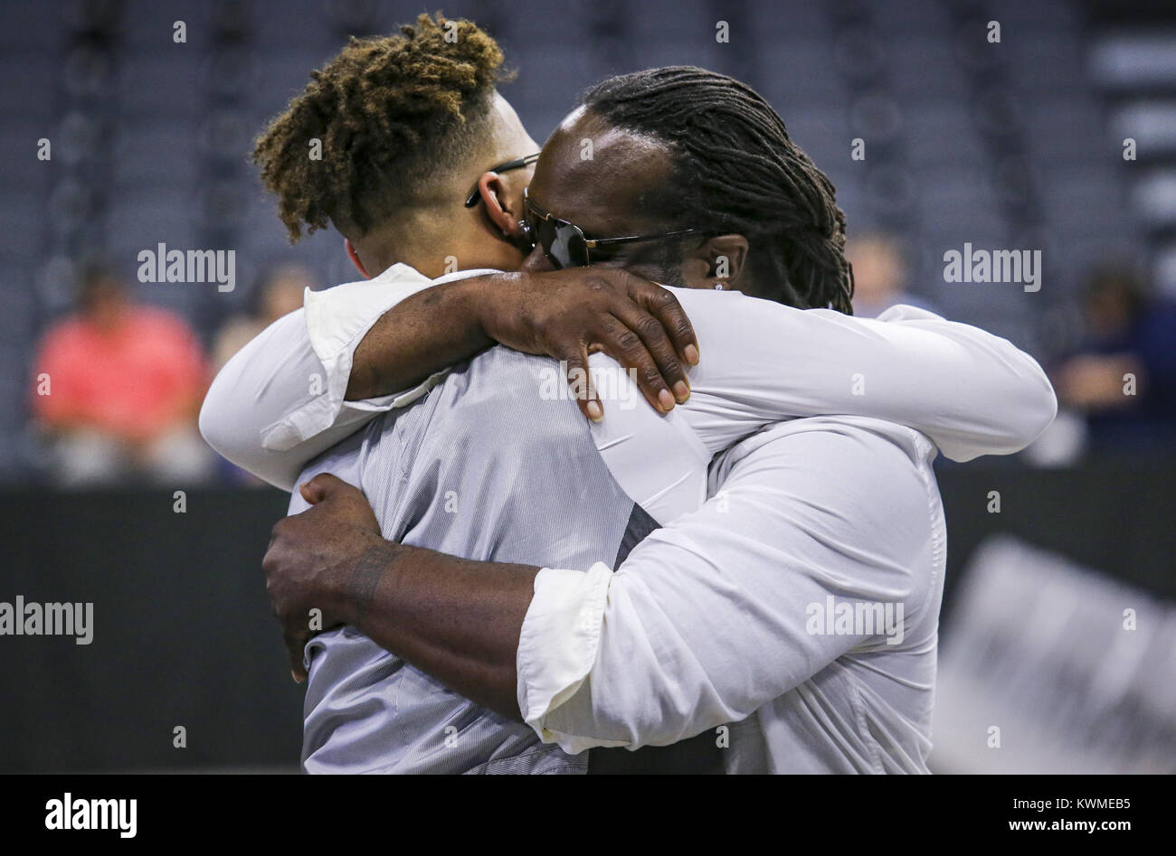 June 4, 2017 - Moline, Iowa, U.S. - Graduate Drevyn Barnes hugs his ...