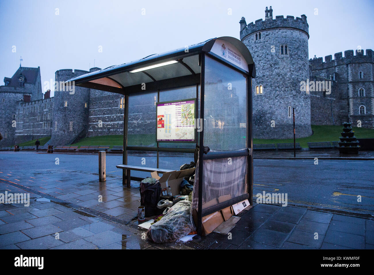 Windsor, UK. 4th Jan, 2018. A homeless person sleeps under a bus ...