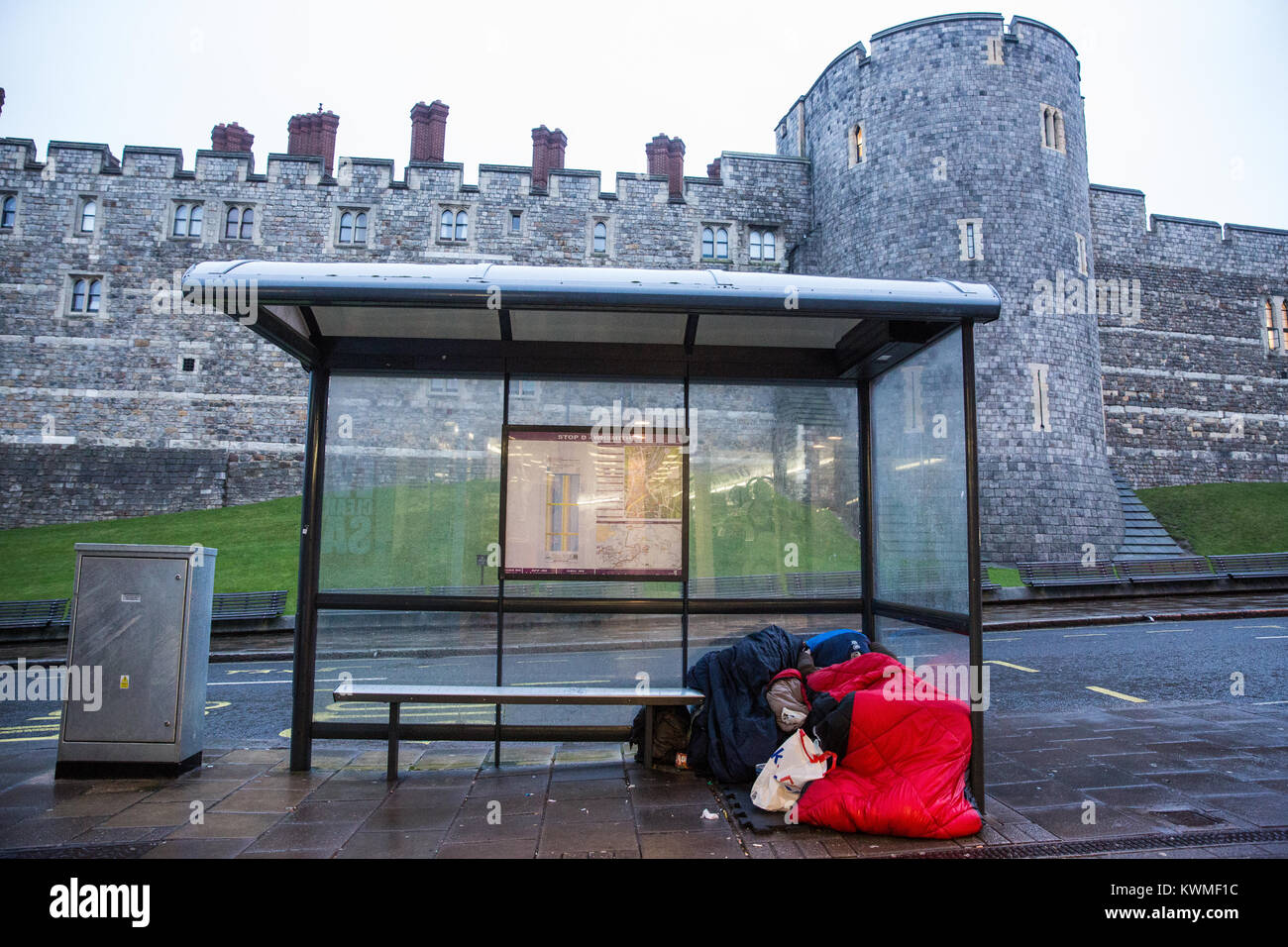 Windsor, UK. 4th Jan, 2018. A homeless person sleeps under a bus ...