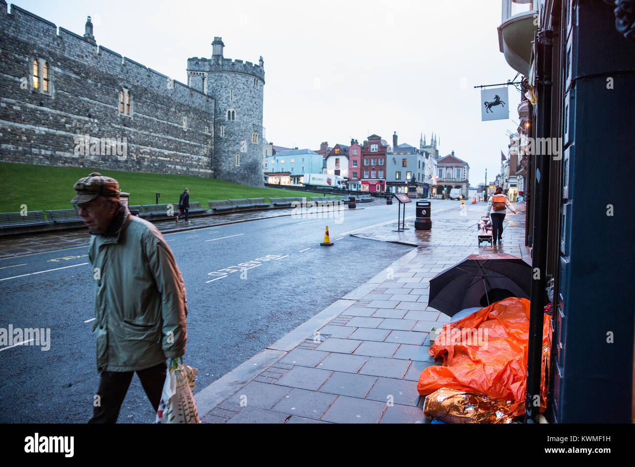 Windsor, UK. 4th Jan, 2018. A homeless person sleeps under a bus ...