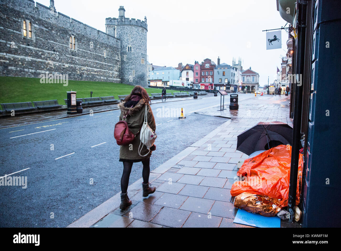 Windsor, UK. 4th Jan, 2018. A homeless person sleeps under a bus ...