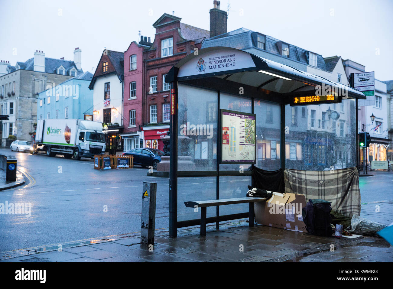 Windsor, UK. 4th Jan, 2018. A homeless person sleeps under a bus ...