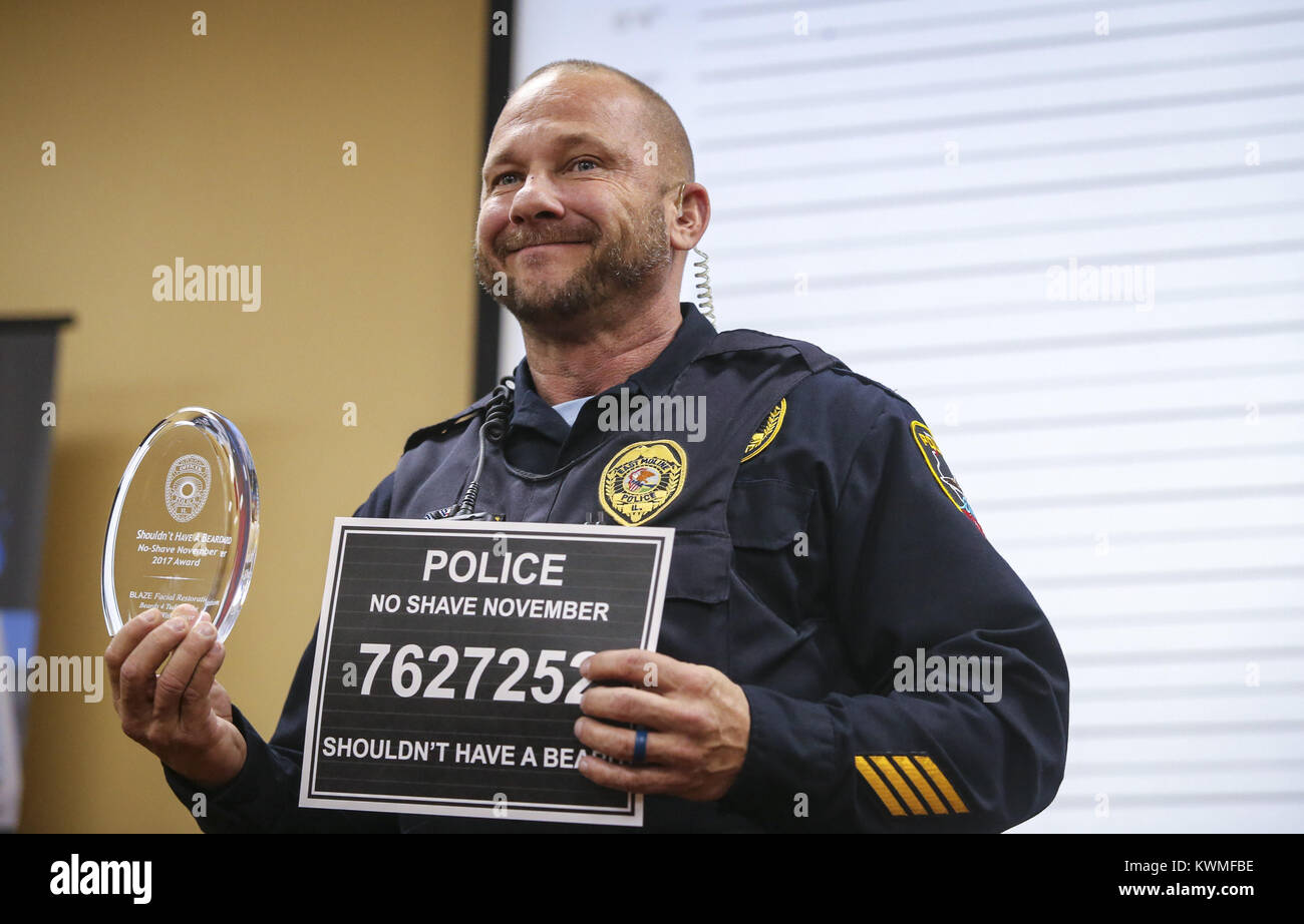 Moline, Iowa, USA. 30th Nov, 2017. Lt. Brian Foltz of the East Moline ...
