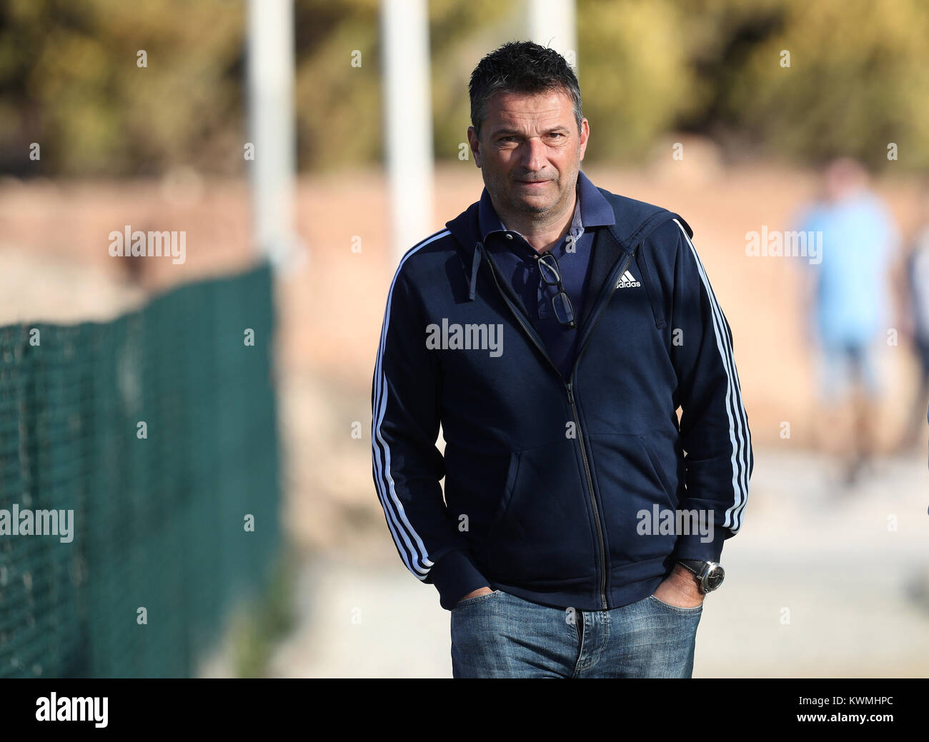 Schalke manager Christian Heidel arrives at the pitch for a training ...