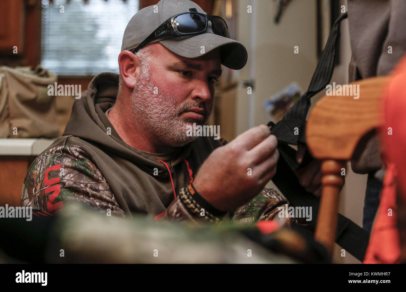 Long Grove, Iowa, USA. 2nd Dec, 2016. Jeff Schulz takes a look at his ...