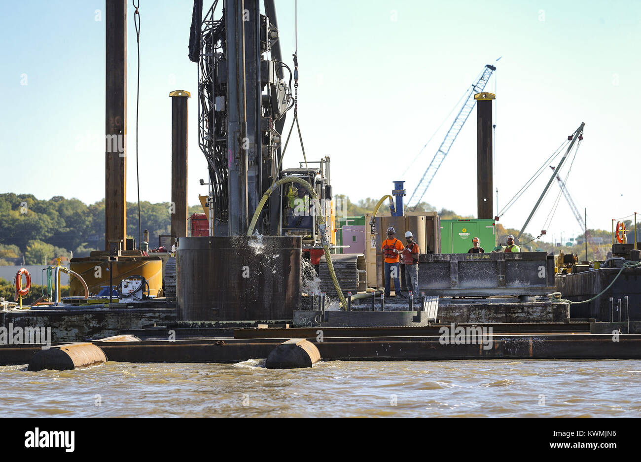 Moline, Iowa, USA. 16th Oct, 2017. Workers use drill equipment to ...