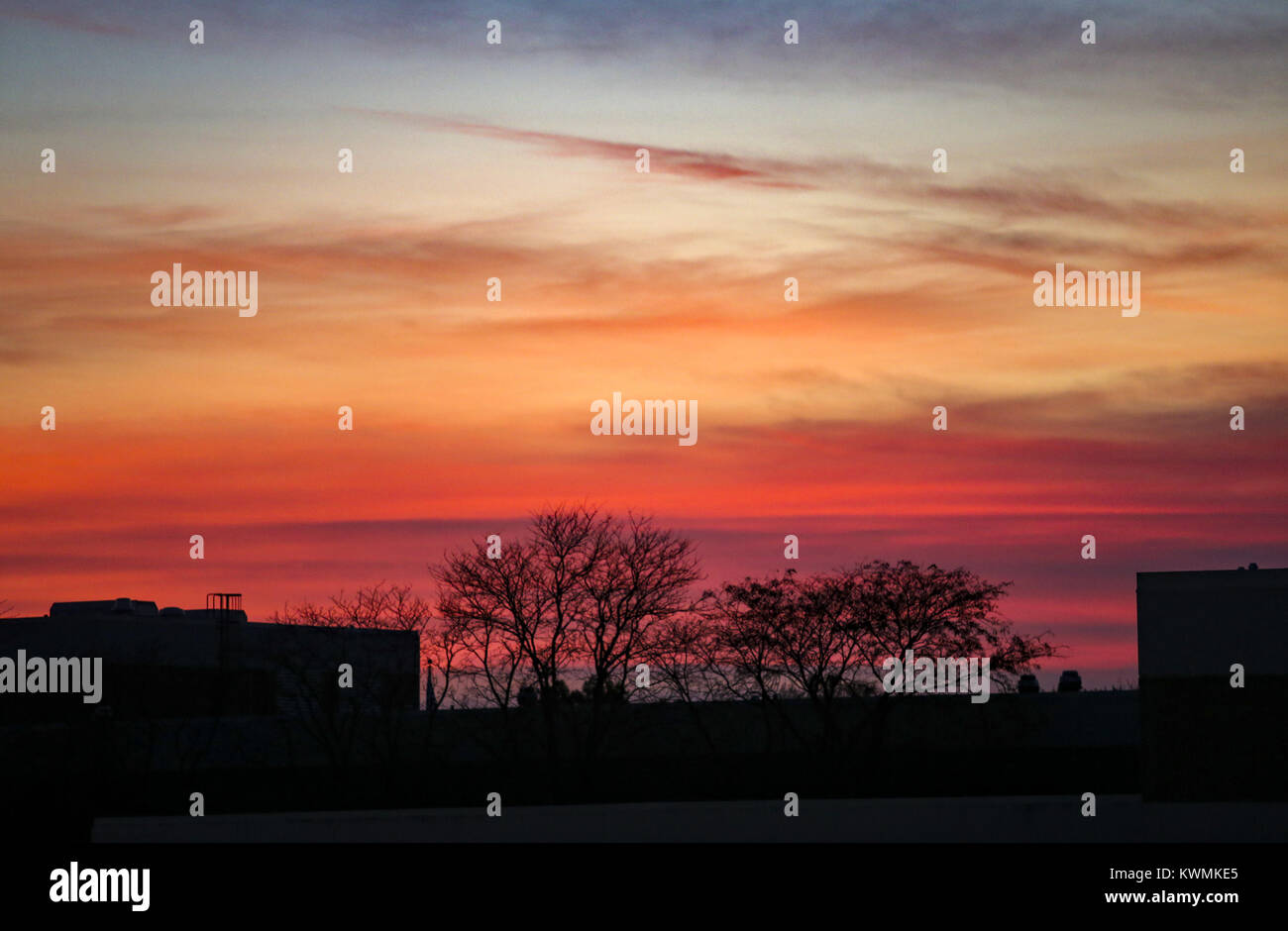 November sun sets behind hi-res stock photography and images - Alamy