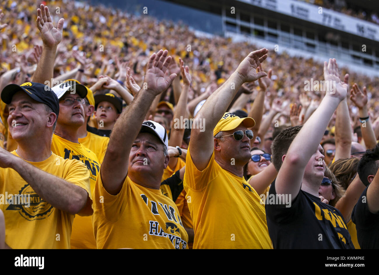 Iowa City, Iowa, USA. 16th Sep, 2017. Iowa Hawkeyes fans wave to ...