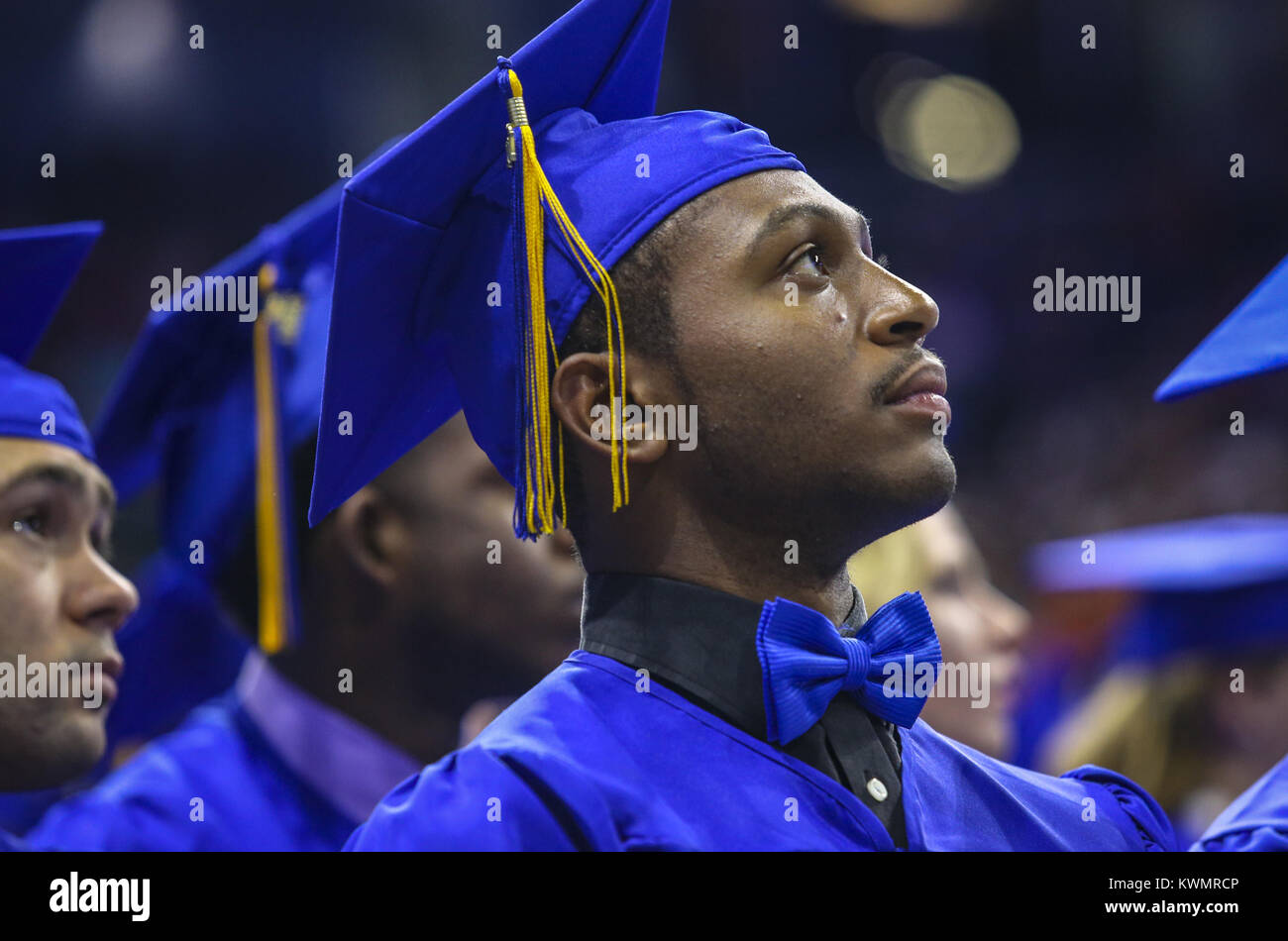 Moline, Iowa, USA. 4th June, 2017. Graduate Matthew Acosta sits and ...